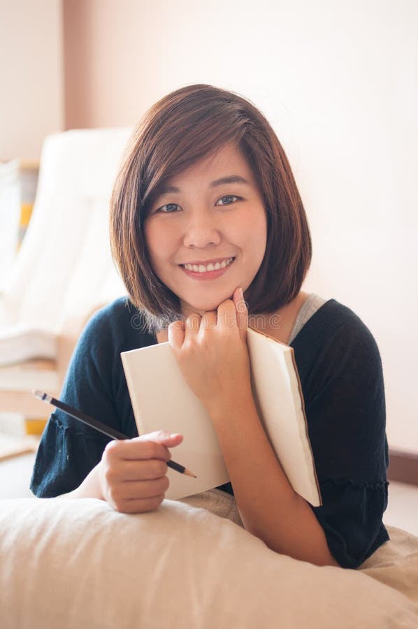 Woman Holding Notebook with Pencil. Stock Image - Image of lifestyle ...