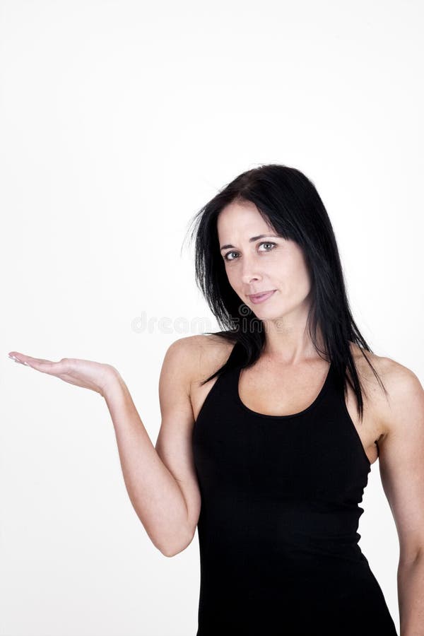 Woman holding out her hand stock image. Image of brunette - 17984641