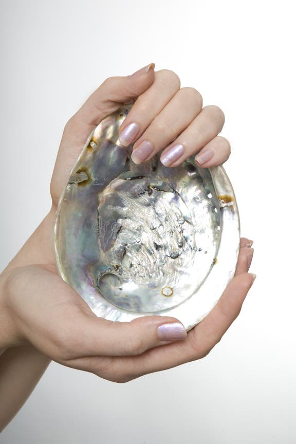 Woman Holding an Abalone Shell Stock Photo - Image of cosmetics ...