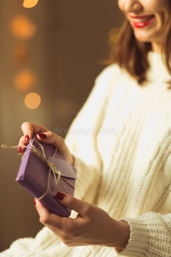 Woman Holding Packed Present Stock Image - Image of woman, christmas ...