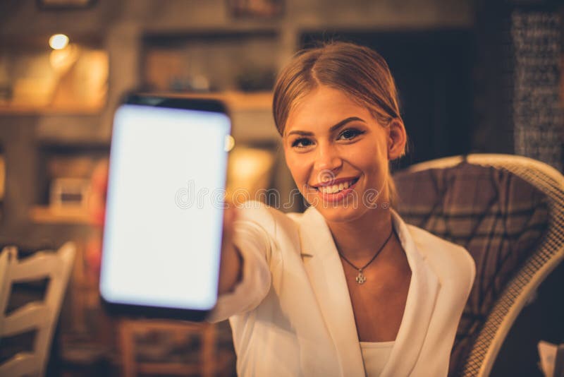 Woman holding phone. stock image. Image of looking, business - 122685275