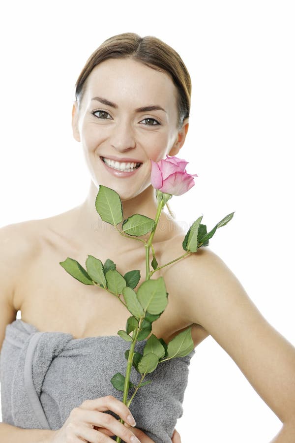 Woman holding a pink rose stock image. Image of romantic - 56739483