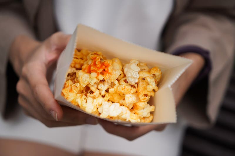 Woman Holding Popcorn Cheese in a Paper Bag in Hand Stock Photo - Image ...