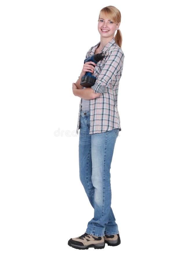 Woman holding a power tool stock photo. Image of power - 34472640