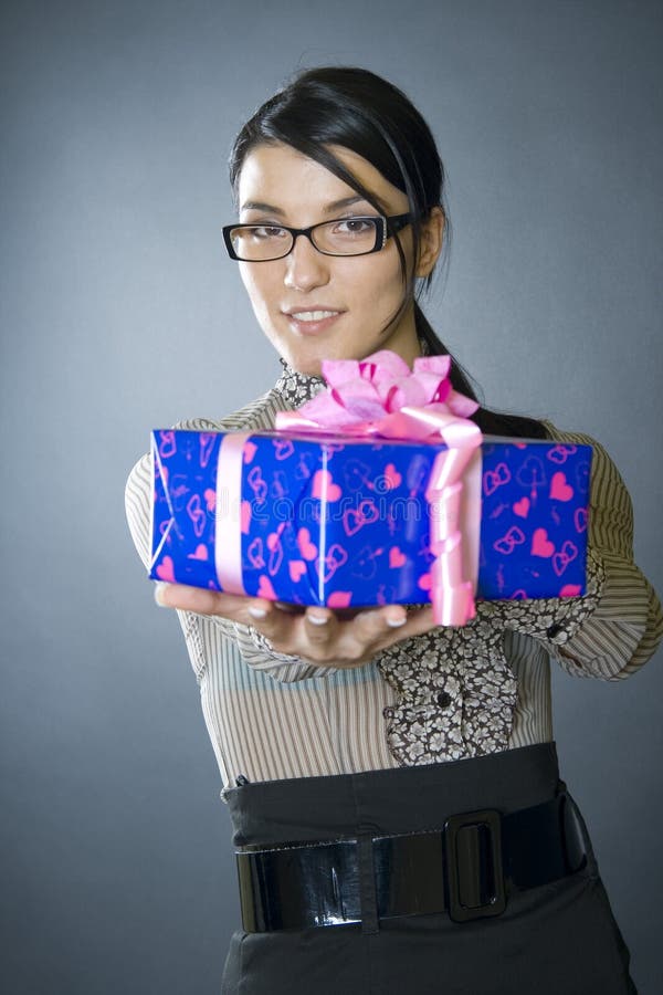 Woman holding a present stock image. Image of people, female - 7508101