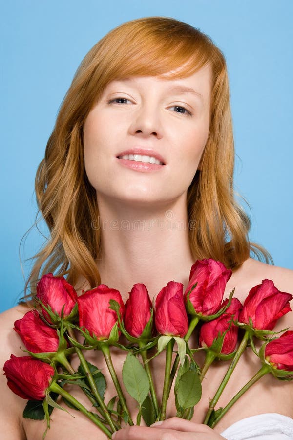 Woman holding roses stock image. Image of elegant, gift - 62561131