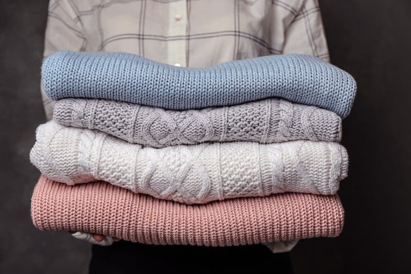 Woman Holding Stack of Folded Warm Knitted Sweaters Stock Image - Image ...