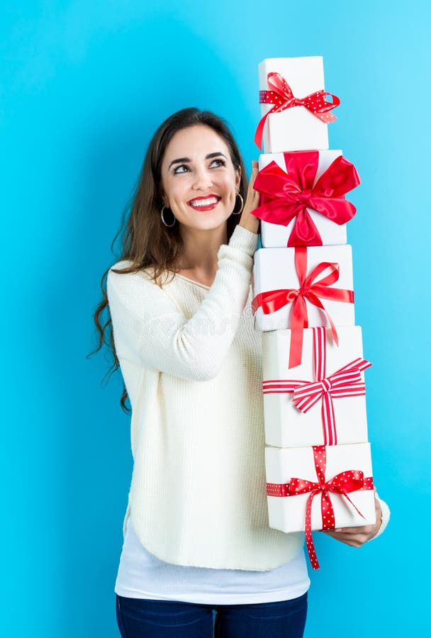 Woman Holding a Stack of Gift Boxes Stock Image - Image of lady, winter ...