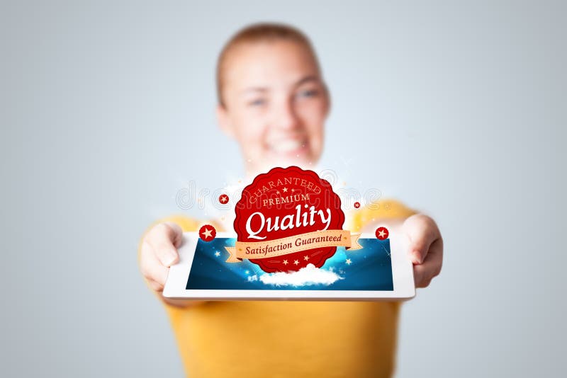 Woman Holding Tablet with Red Quality Label in Clouds Stock Image ...
