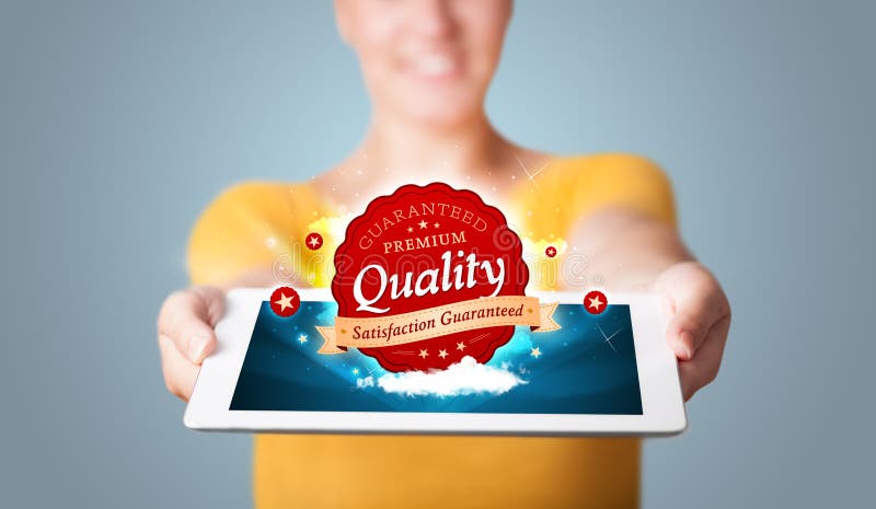 Woman Holding Tablet with Red Quality Label in Clouds Stock Photo ...