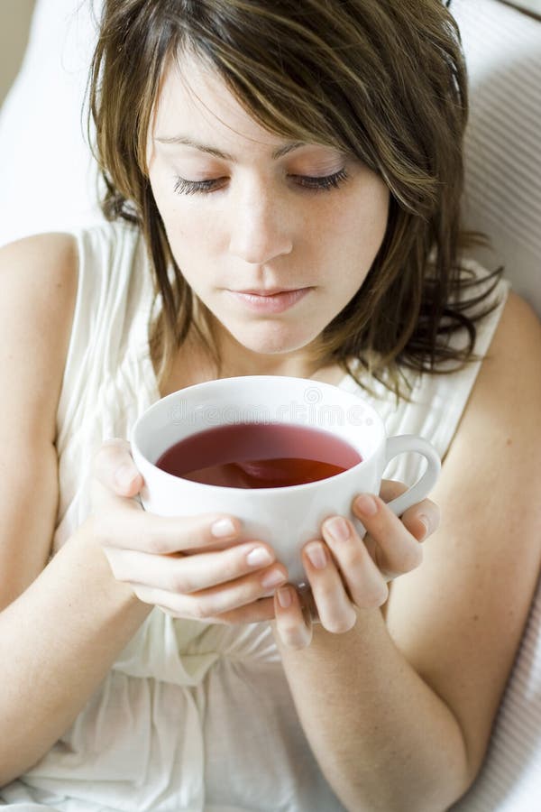 Woman holding tea stock image. Image of coffee, beverage - 8661885