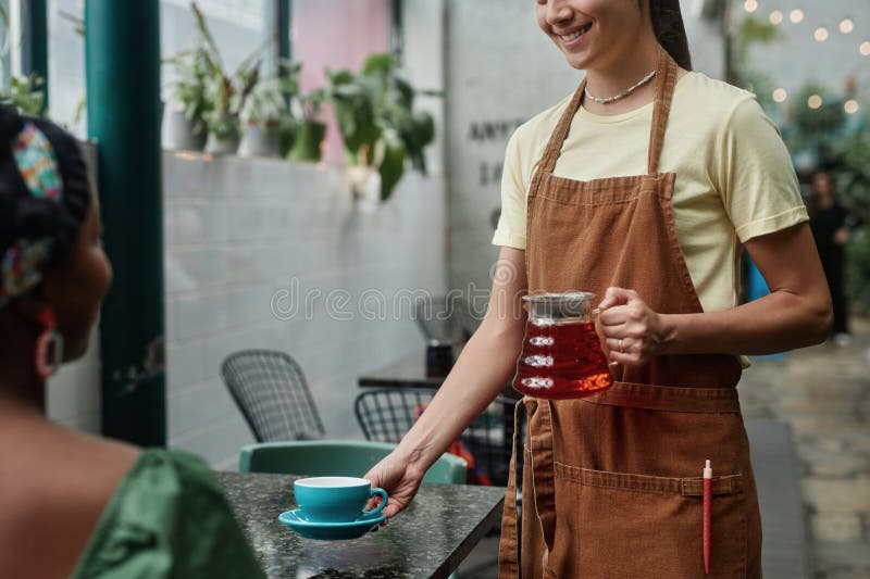 Woman Holding Teapot while Serving Table Stock Image - Image of ...