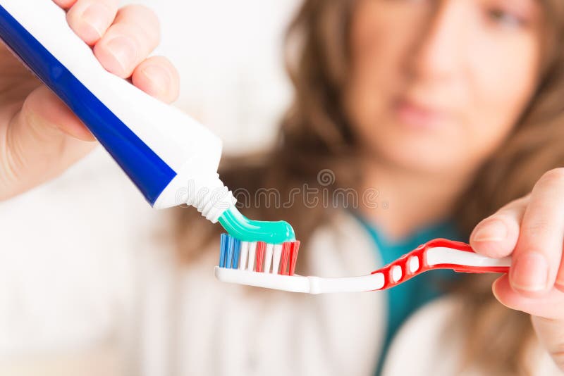 Woman Holding Toothbrush and Toothpaste Stock Image - Image of face ...
