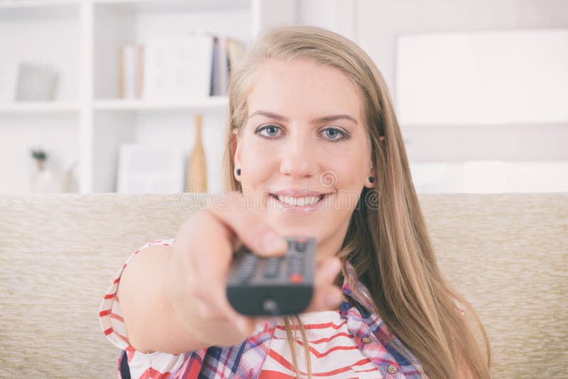 Woman Holding Tv Remote Control and Changing TV Channels Stock Photo ...