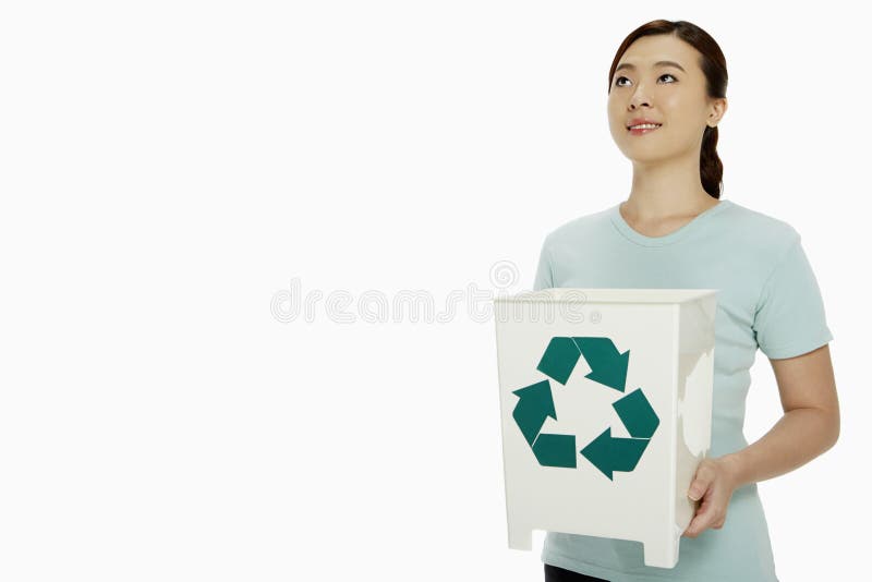 Woman Holding Up a Recycling Bin Stock Photo - Image of green ...