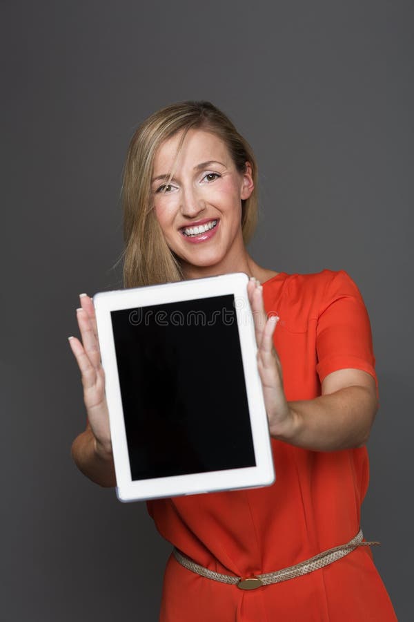 Woman Holding Up the Screen of a Tablet-pc Stock Photo - Image of ...