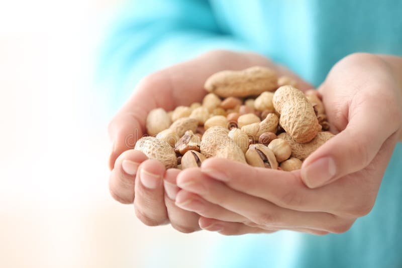Woman Holding Various Tasty Nuts, Closeup Stock Image - Image of tasty ...