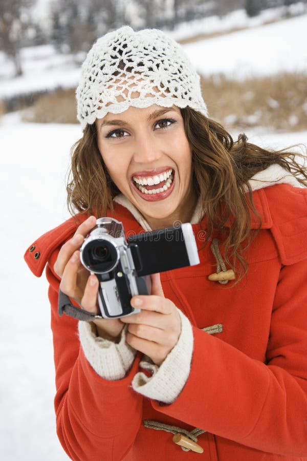 Woman with video camera. stock image. Image of knit, climate - 3182573