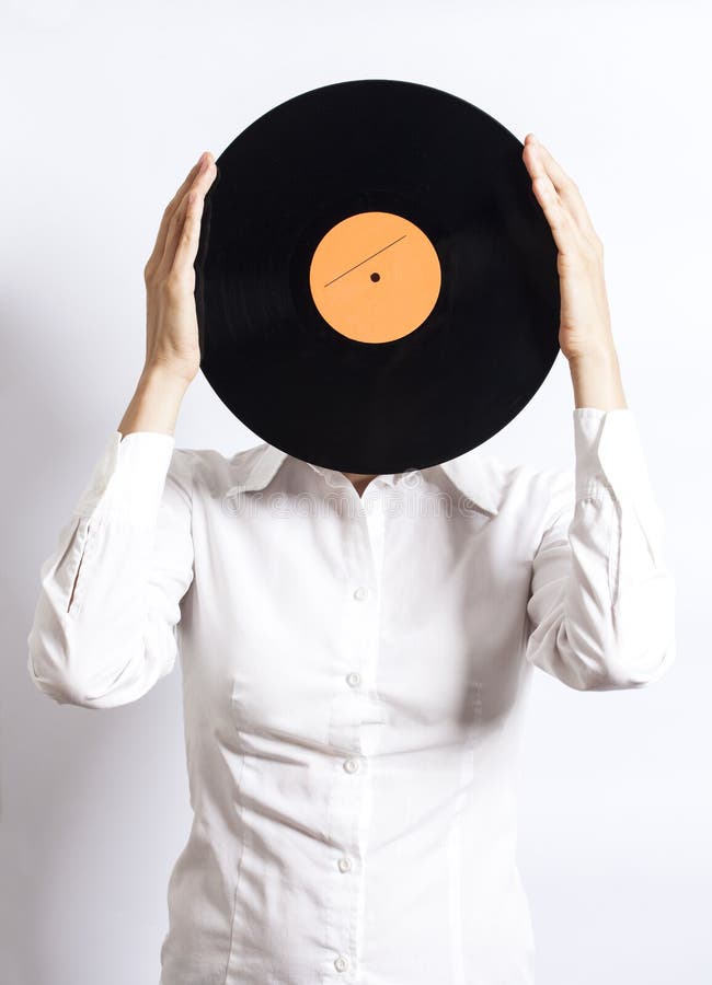 Woman Holding Vinyl Record Over Face Stock Photo - Image of disc ...