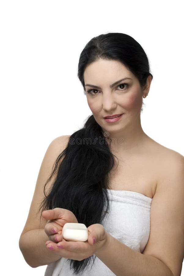 Woman holding a white soap stock photo. Image of close - 12713792