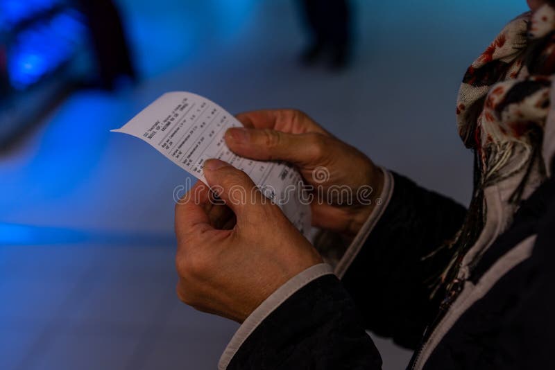 Woman Holds a Check after Payment of Purchases Stock Image - Image of ...