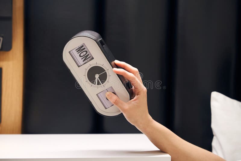 Woman Holds an Electronic Device in Her Hand Stock Photo - Image of ...