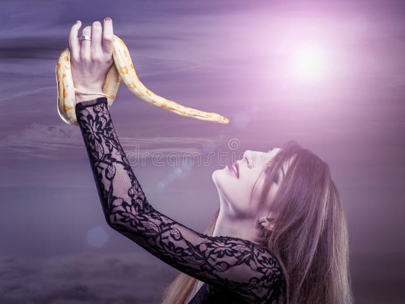 The Beautiful Woman with the Big Yellow Snake Stock Image - Image of ...