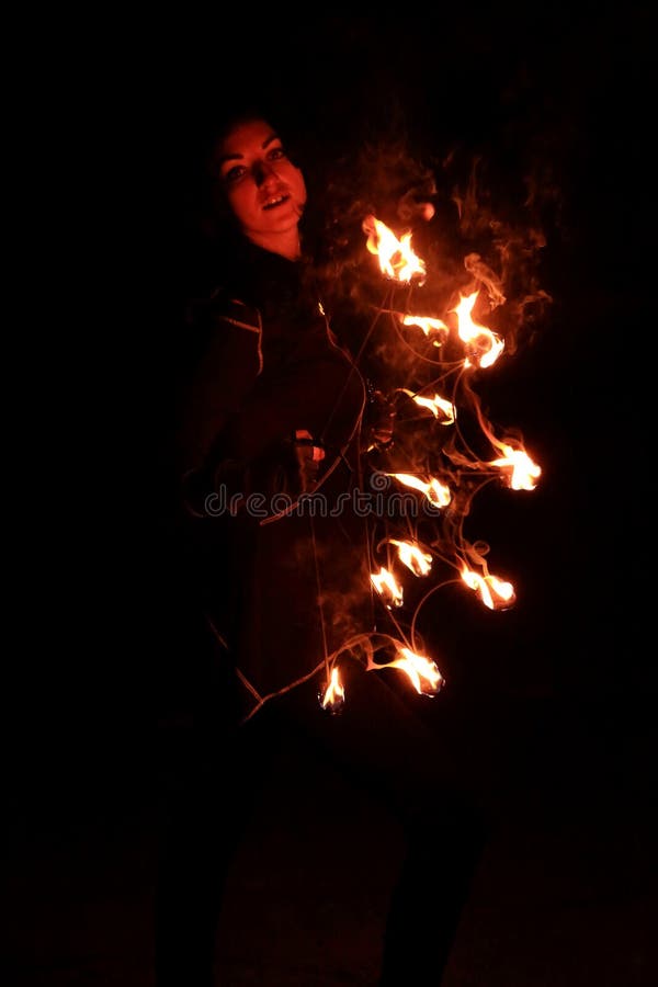 Woman Holds in His Hand the Fire Stock Image - Image of flame, evening ...