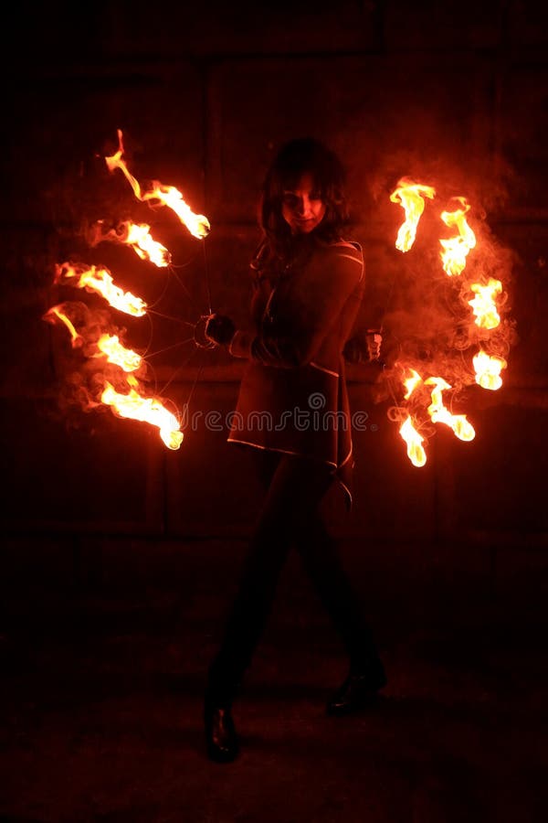 Woman Holds in His Hand the Fire Stock Image - Image of dancer, party ...