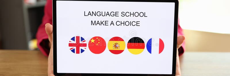 Woman Holds Tablet with Text Language School and Offers To Choose ...