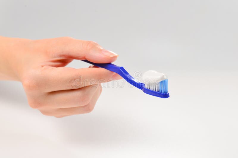 Woman Holds Toothbrush with Toothpaste in Her Hand Isolated on White ...