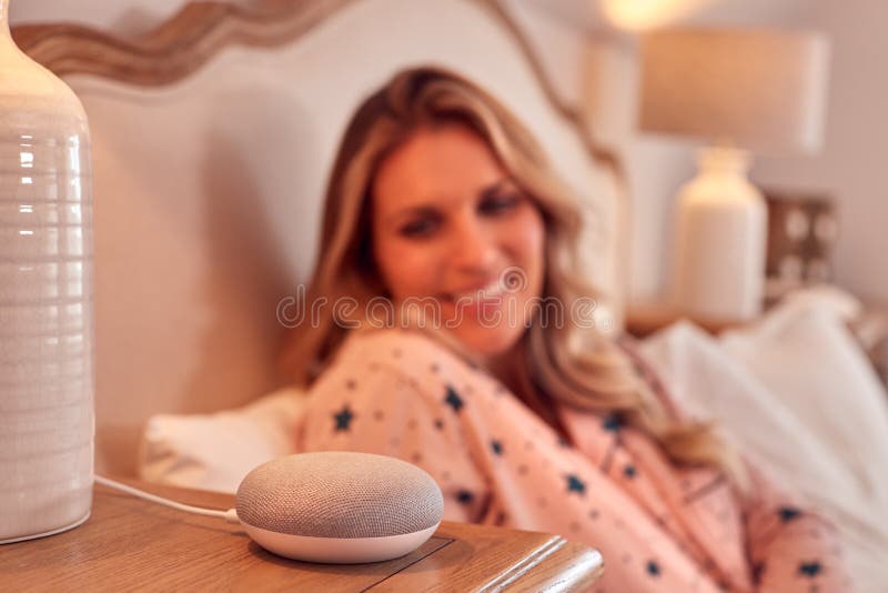 Woman at Home in Bed Using Digital Personal Assistant Stock Photo ...