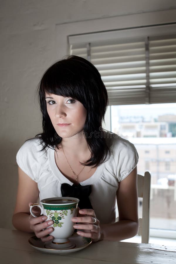 Woman at Home Sipping Tea from a Cup Stock Image - Image of curly ...