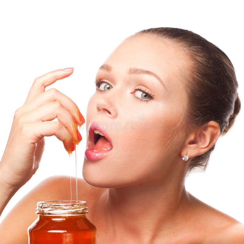 Woman with honey stock photo. Image of looking, caucasian - 15915722