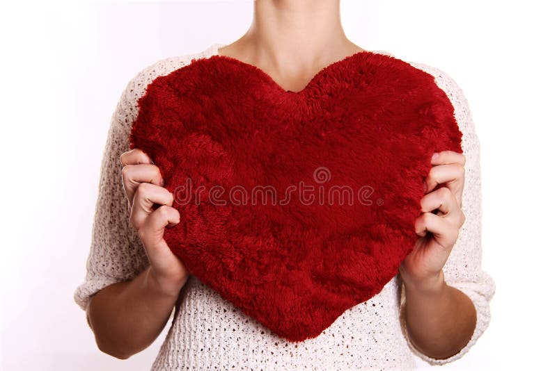 Young Woman Hugging Heart Shaped Pillow Stock Photos - Free & Royalty ...