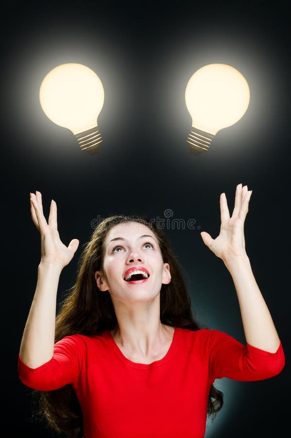 Woman and Idea Light Bulbs stock image. Image of discovery - 6376953
