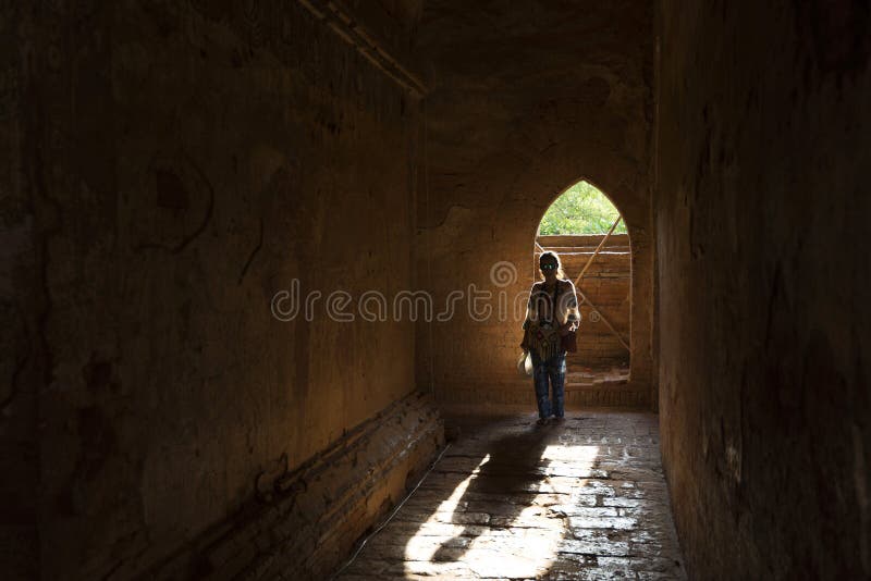 Woman Inside Dhammayangyi Pagoda, Bagan, Myanmar Stock Photo - Image of ...