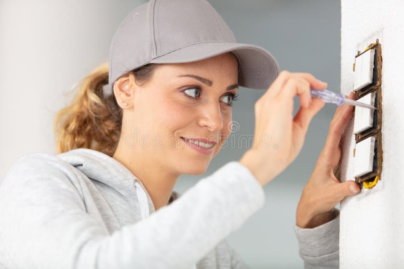 Woman Installingnew Socket into Wall Stock Image - Image of renovating ...