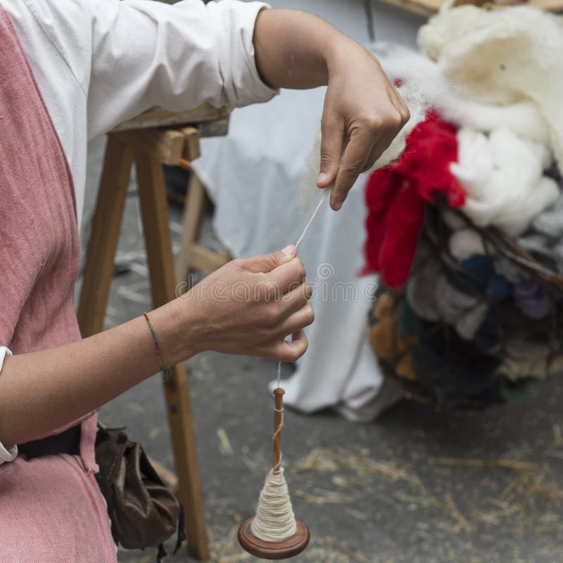 Woman Intent On Making A Piece Of String Stock Image - Image of pink ...