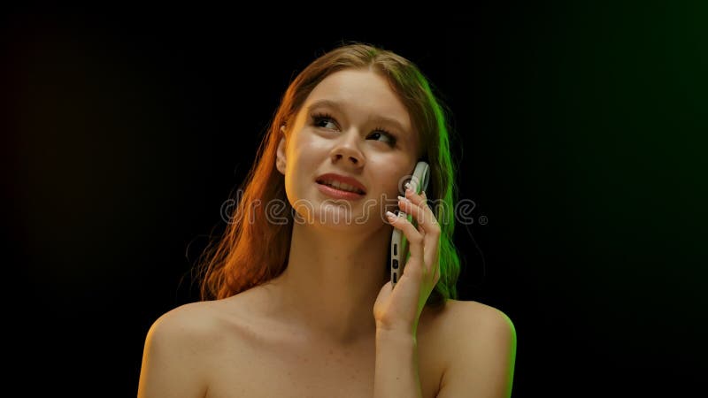Woman Interacting with Phone in Subtle Lighting Stock Image - Image of grace, light: 391195791