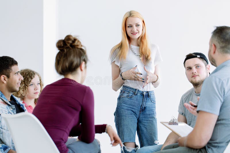 Woman introducing herself stock photo. Image of patients - 110269396