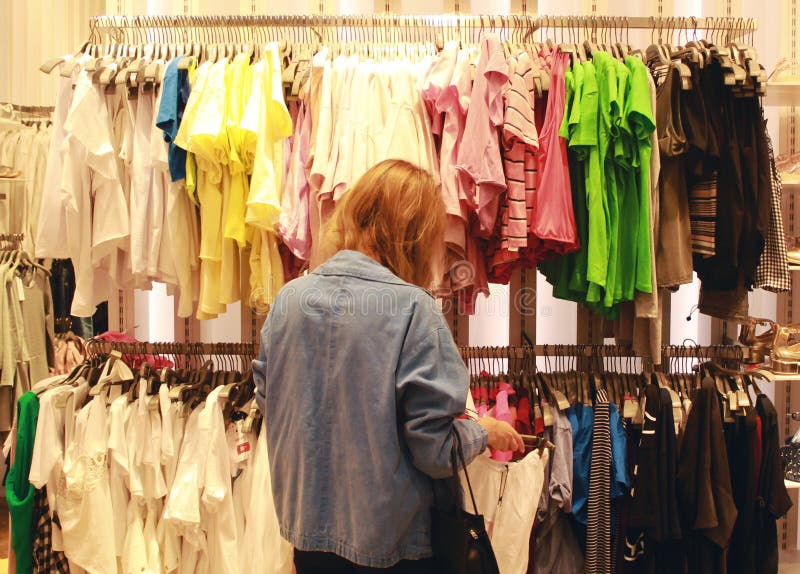 A Woman in a Jeans Jacket is Shopping Editorial Photo - Image of good ...