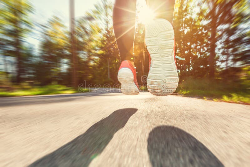Woman Jogger Running Down the Road Stock Photo - Image of people ...