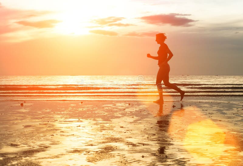 Woman Jogger at Sunset on the Seashore. Stock Image - Image of health ...