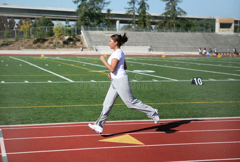 Woman Jogging stock image. Image of female, track, brunette - 1406443