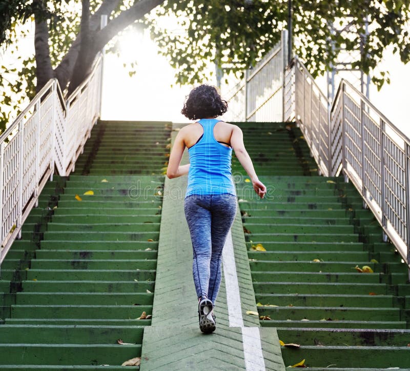 A Woman Jogging through the City Stock Image - Image of lifestyle, city ...