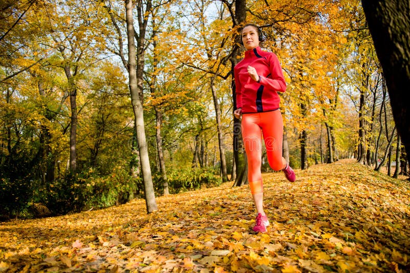 Woman jogging in nature stock photo. Image of park, action - 49158484