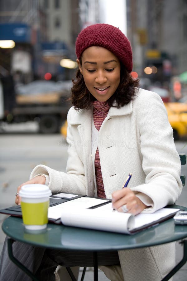Woman Jotting Down Notes stock photo. Image of person - 27391244