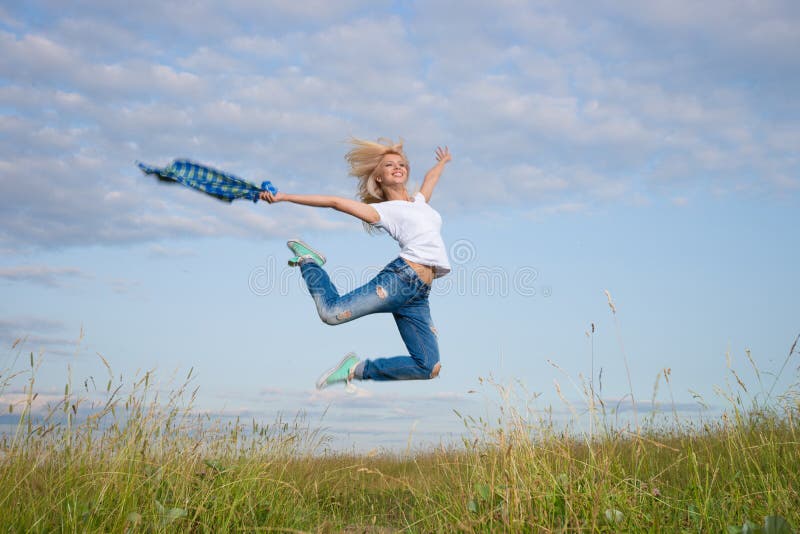 Woman Jump in Green Grass Field Stock Image - Image of acrobat, action ...