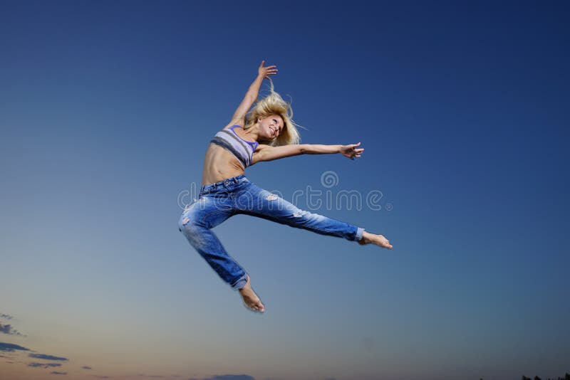 Woman jump at night stock photo. Image of exercise, fitness - 38793396